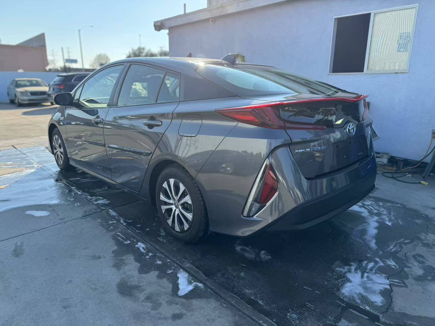 2021 Toyota Prius Prime XLE with 49k miles new in