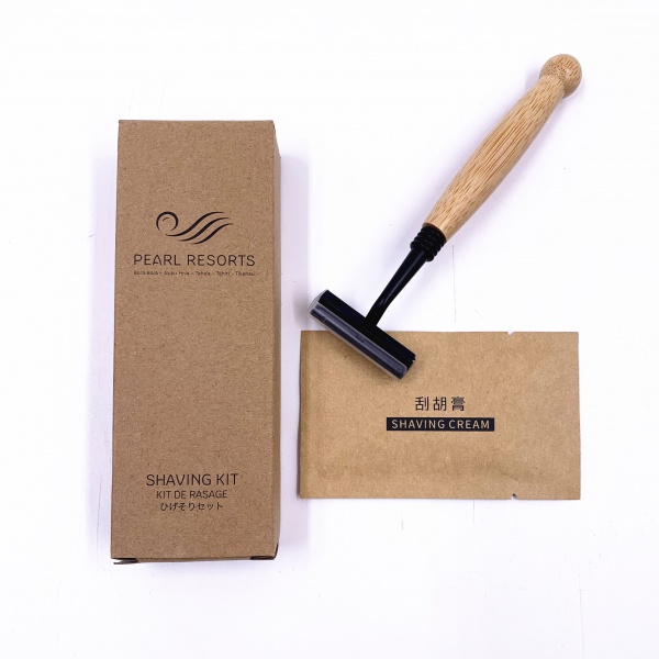 Shaving kit with bamboo razor and shaving cream in paper sachet
