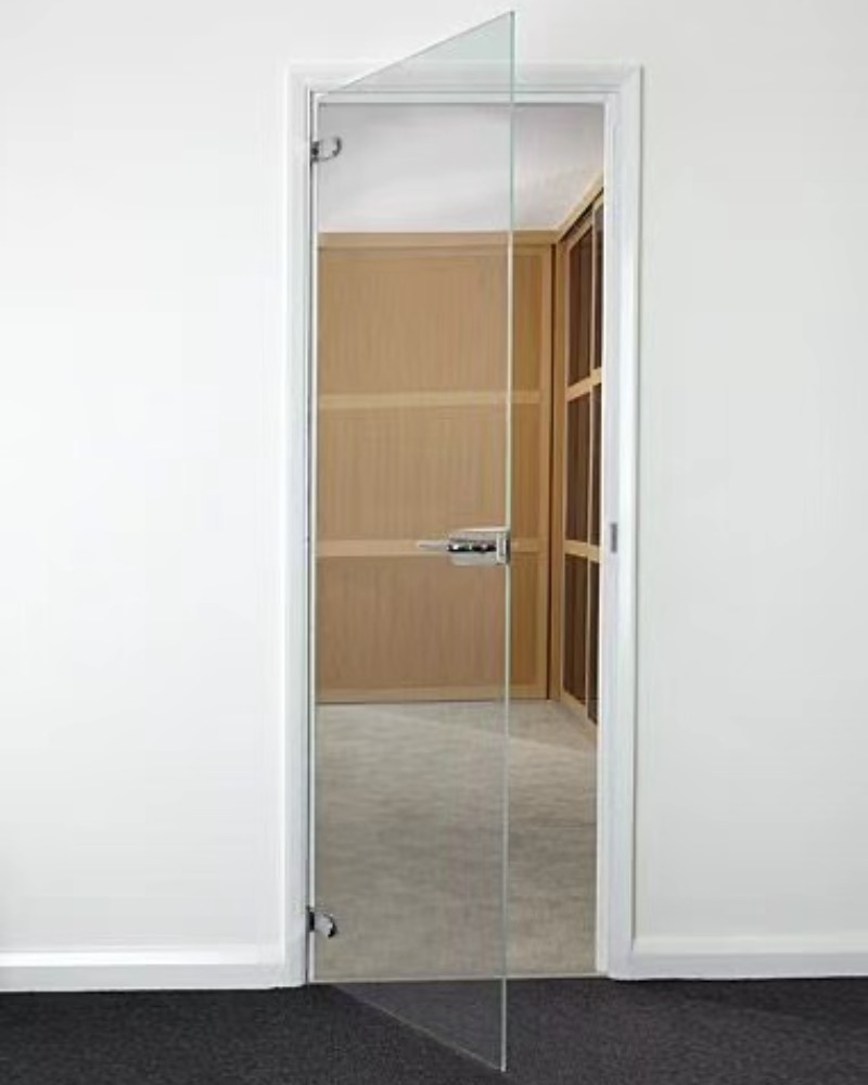 Great view of Framless Glass Floor Spring Doors from AMJ Building