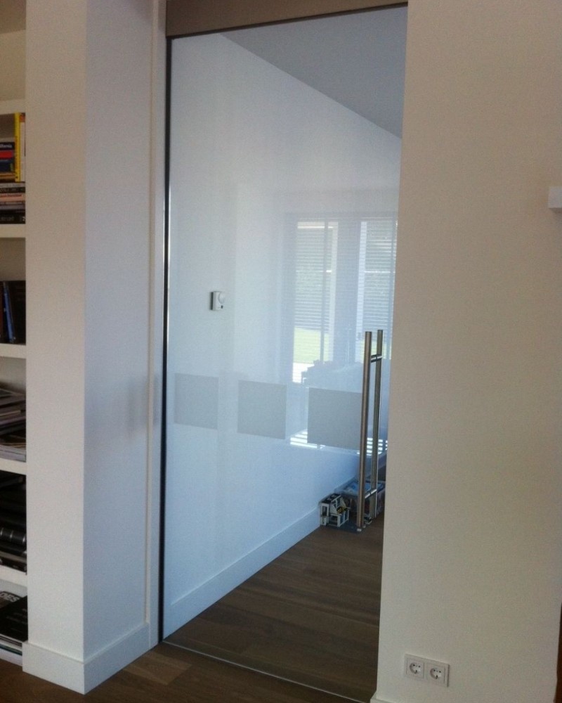 Great view of Framless Glass Floor Spring Doors from AMJ Building
